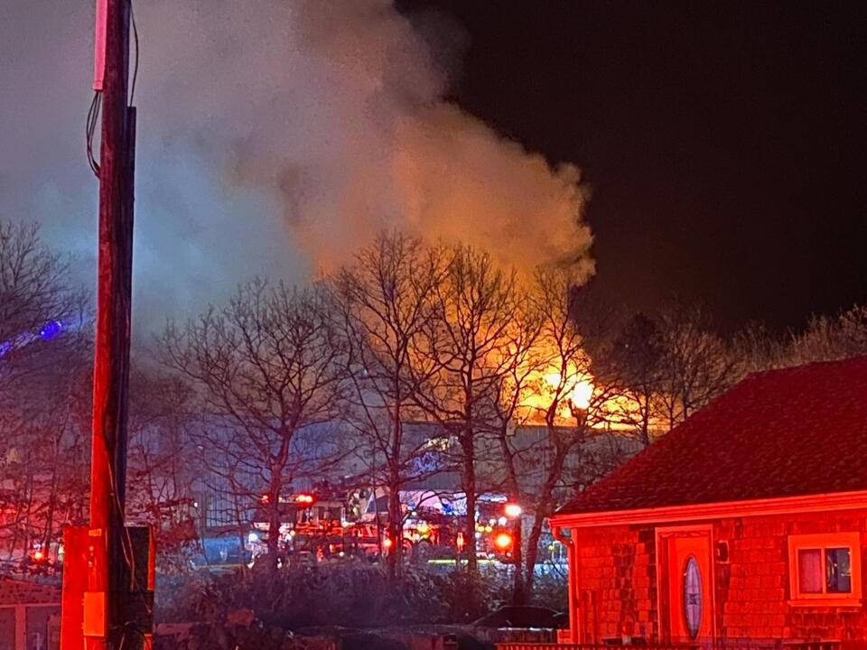 New details: Four alarm fire breaks out in large commercial building in ...