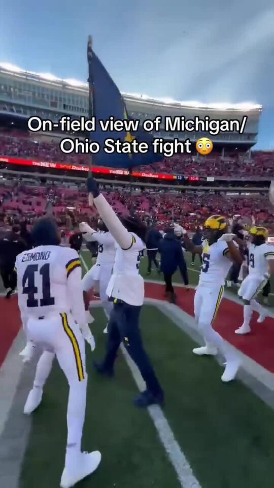 A fight broke out after Michigan upset Ohio State and it got worse after Michigan planted their ...