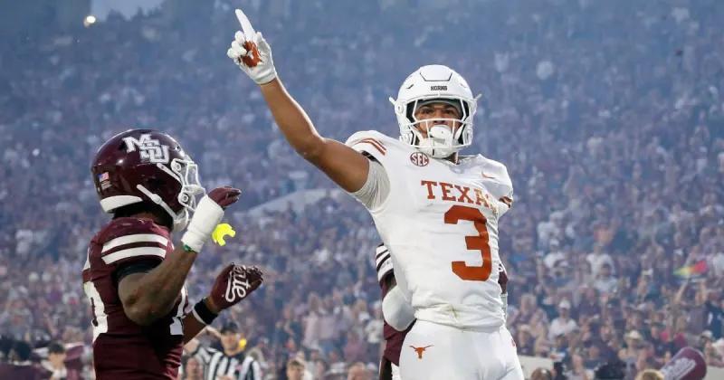 Texas’ receivers have a banner night capped by Emmett Mosley’s overtime ...