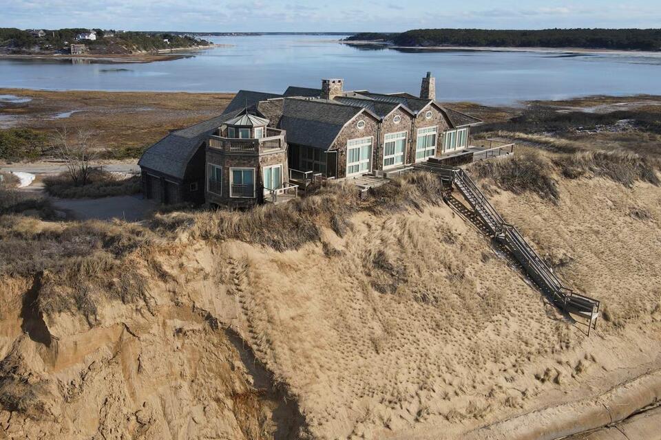 A huge luxury home is about to fall into the sea and nobody knows what ...