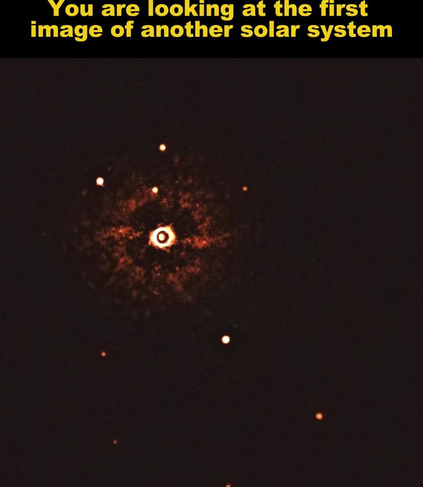 First Direct Image of Two Exoplanets Orbiting a SunLike Star - NewsBreak