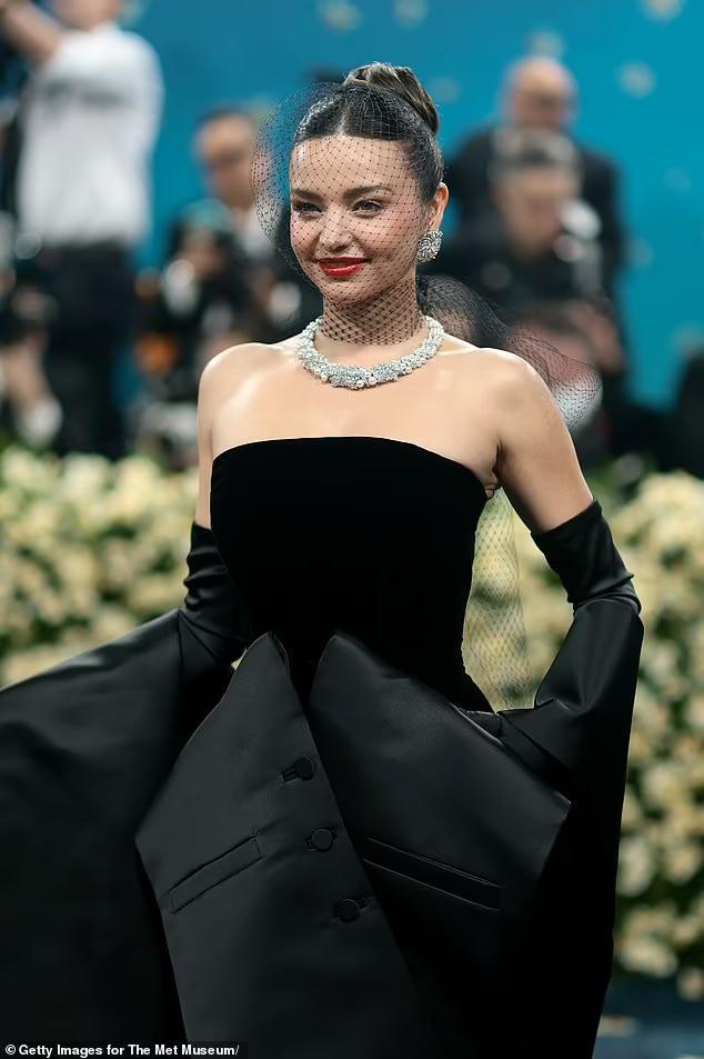 Miranda Kerr steals the spotlight as she joins fashion's elite at the ...