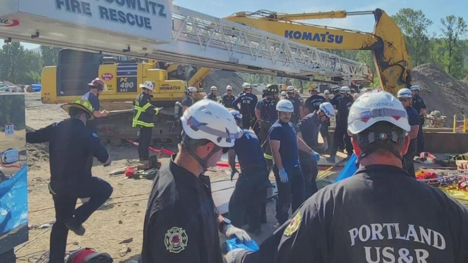 Injured worker rescued from 15-foot trench at construction site in ...
