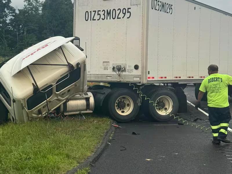 Jackknifed tractor trailer closes lanes on I-95 north in Milford