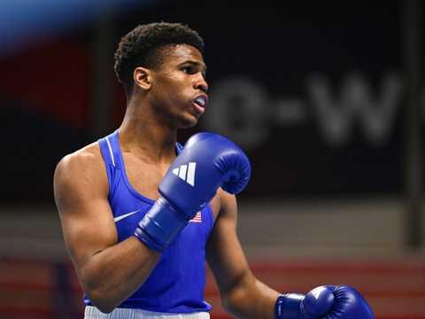 'I'm writing my chapter in history': 21-year-old boxer to represent ...
