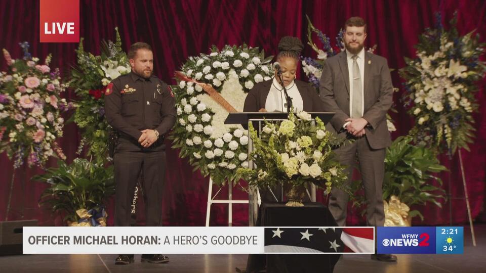 Law enforcement officials share remarks about Officer Michael Horan ...