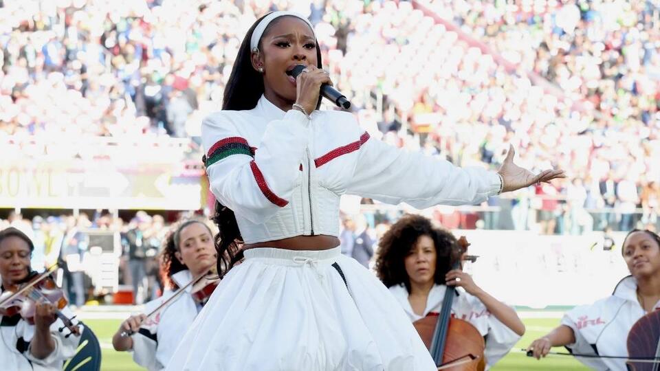 Coco Jones Channels Whitney Houston With Karl Kani Look for Super Bowl ...