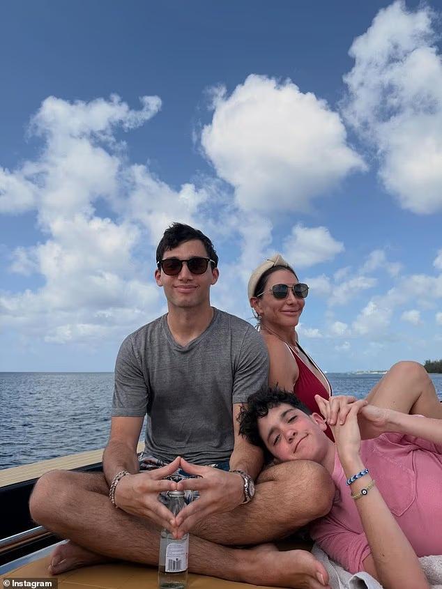 Lauren Silverman poses in swimsuit with Simon Cowell as she shares ...