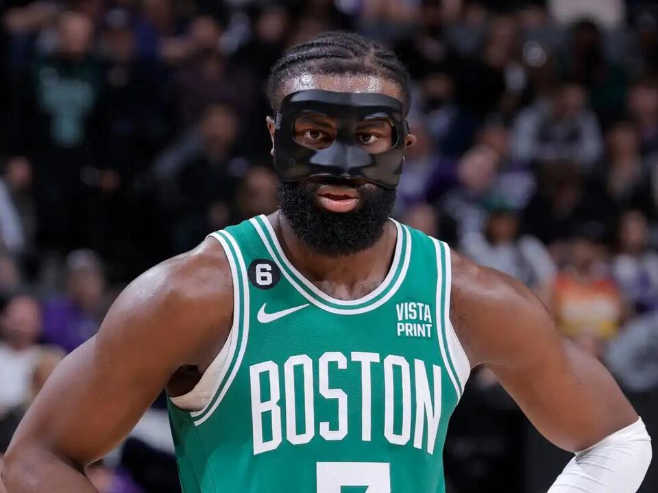 Why does Jaylen Brown wear a mask?