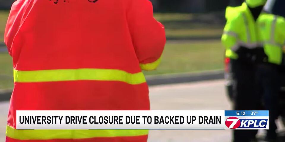 University Drive reopens after overnight flooding and icing from ...