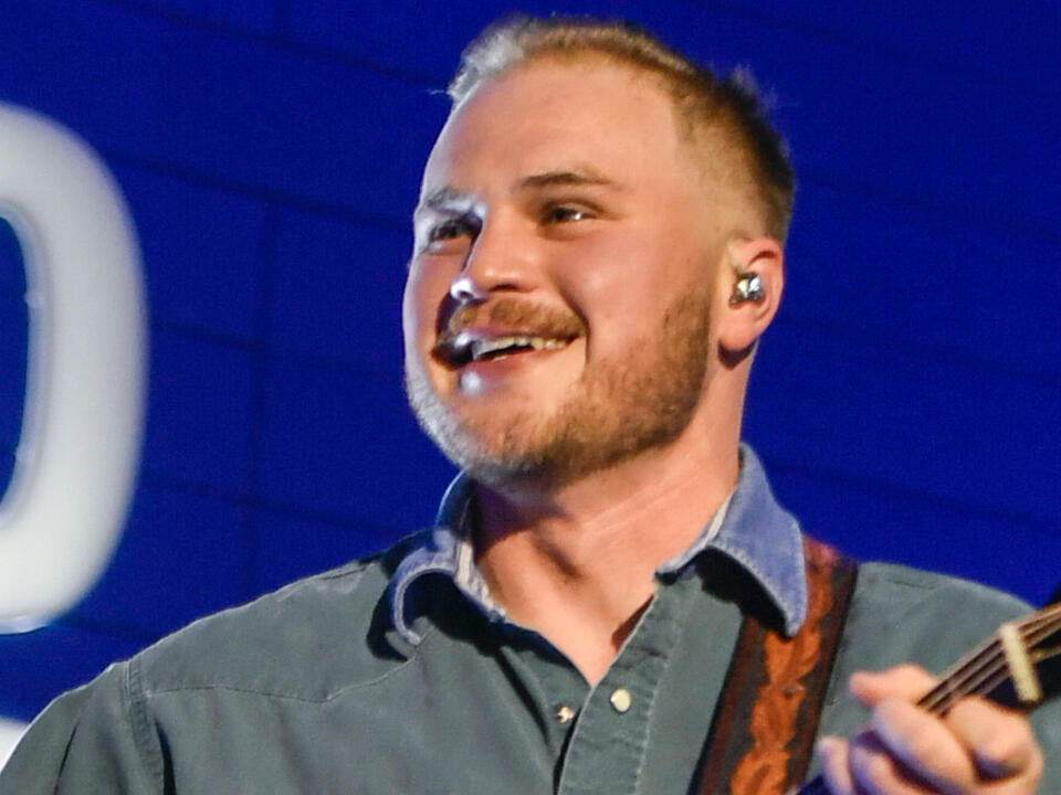 Boos Rain Down After Zach Bryan Shouts Out the Wrong City During Concert