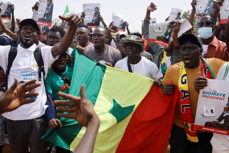 Hundreds protest as Senegal awaits new election date - NewsBreak