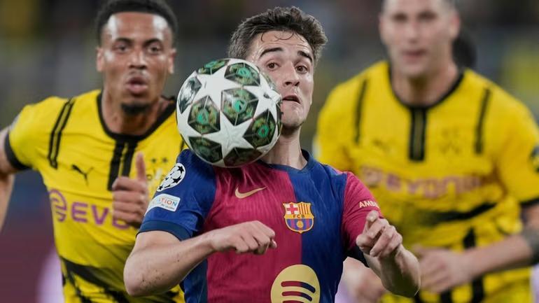 Barcelona's Gavi posts message from hospital bed after successful knee ...