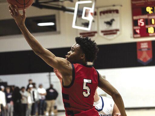 Maranatha boys hoops falls to Holy Family