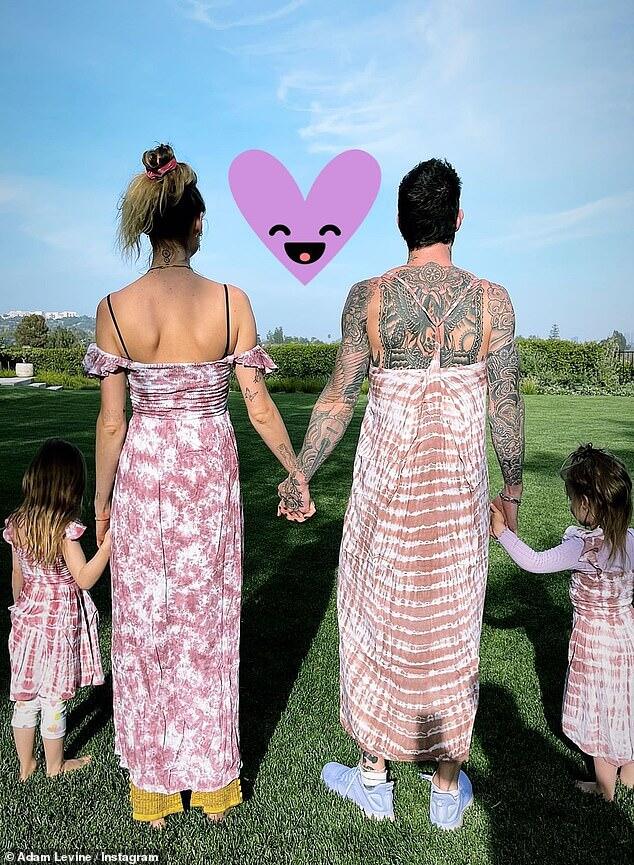Adam Levine wears a dress in a sweet family photo to match wife Behati ...