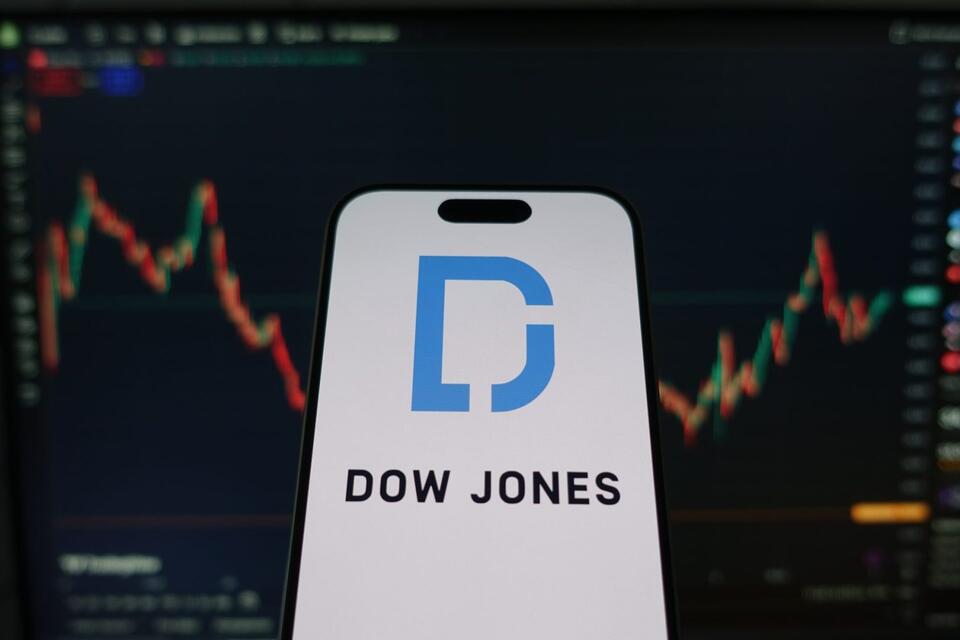 Dow Jones falls 300 points as AI stocks spark market fears - NewsBreak