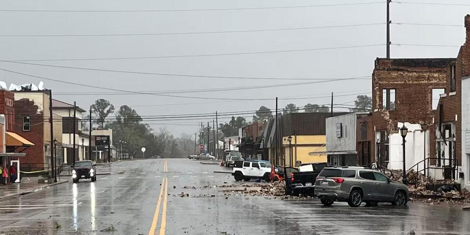Fallen trees and power lines cause damage, road closures across the ...