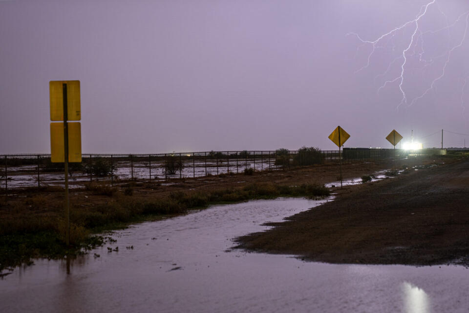 Storm brings flooding, outages, hours-long lightning show. More ...