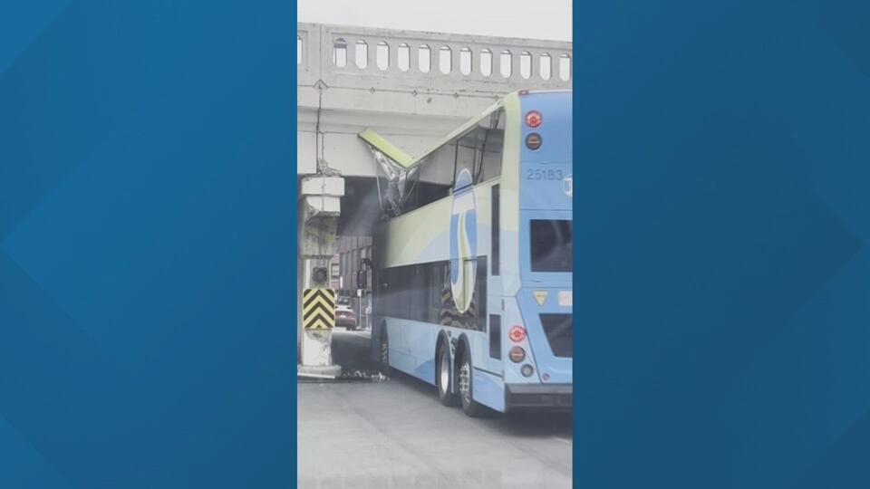 Spokane double-decker bus collides with railroad bridge; four ...