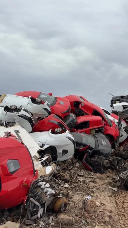 Stunning images of EV ‘graveyard’ filled with broken down cars that can ...