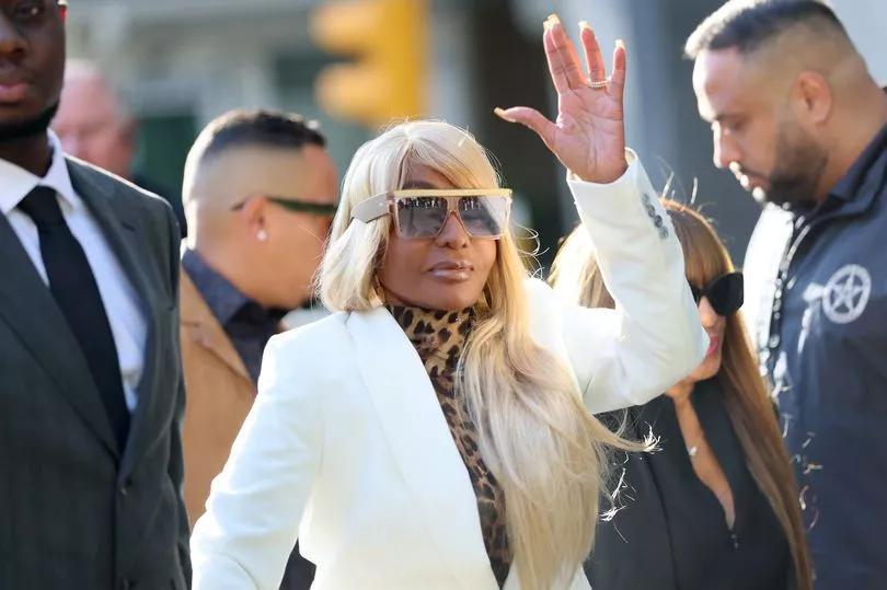 Diddy's family forms 'unbreakable line' in 'somber' display as they ...