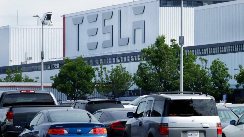 Tesla faces a lawsuit after a robotic arm knocked a worker unconscious ...