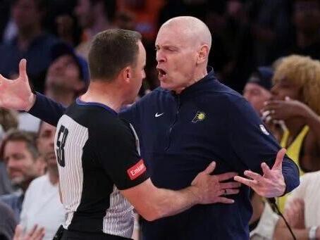 Indiana Pacers head coach Rick Carlisle, at right arguing a call with ...