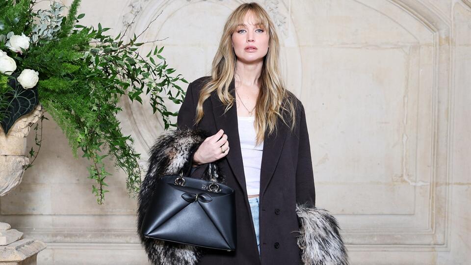 Jennifer Lawrence Levels up Tank Top & Jeans With Dior Fur-Trim Coat ...