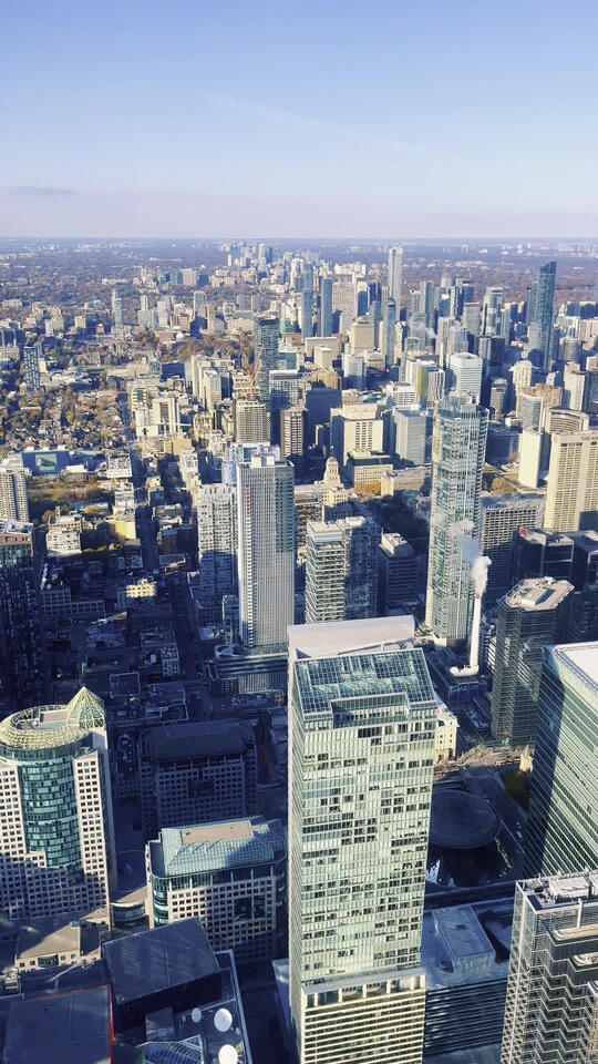 The CN Tower stands tall in the heart of Toronto, piercing the sky with ...