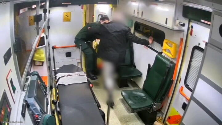 Shocking moment paramedic is pushed out of ambulance by abusive patient ...