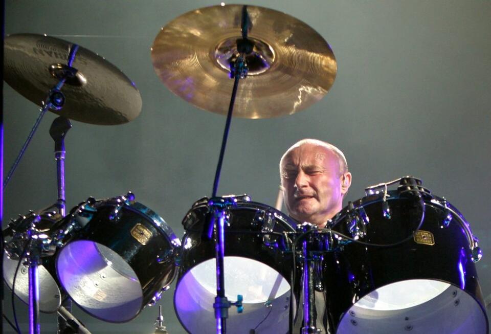 Phil Collins Sits Behind Classic Drum Kit for First Time in Over a ...