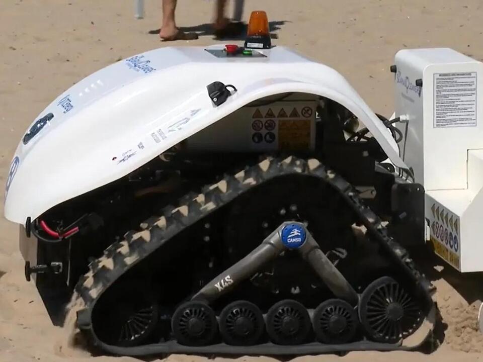 Petoskey students and BeBot the robot team up to clean Great Lakes beaches