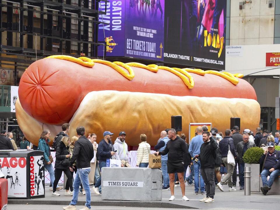 As 65-Foot Hot Dog Looms Large Over NYC, Locals Bars Take Advantage of ...
