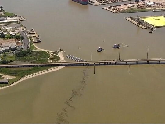 Barge slams into Galveston bridge causing collapse as oil spills into ...