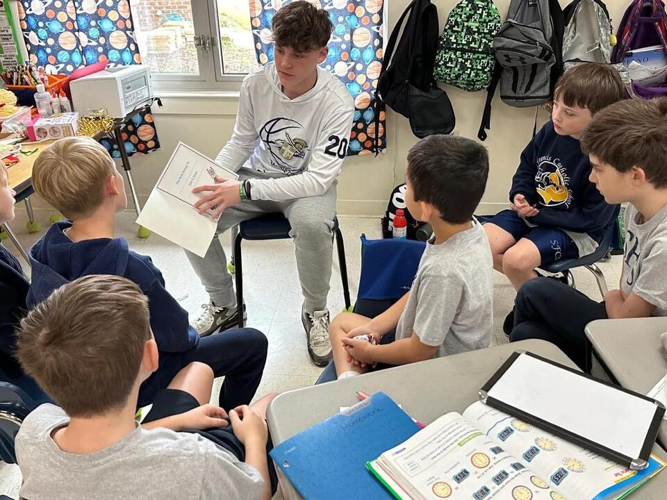 JPII student-athletes serve as role-model readers at Hilton Head school JPII student-athletes serve as role-model readers at Hilton Head school