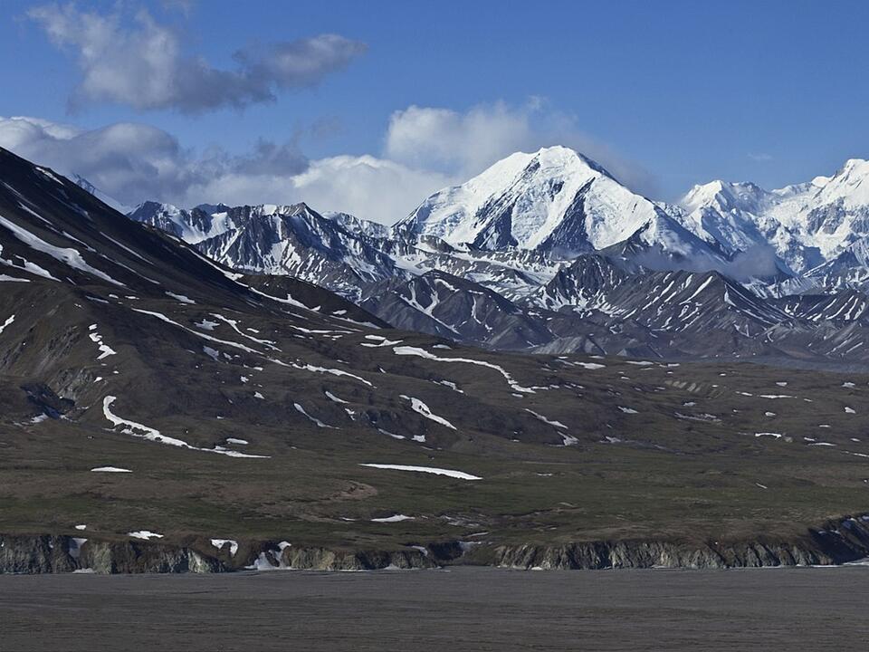 Look, up in the sky! It’s an American flag over Denali!