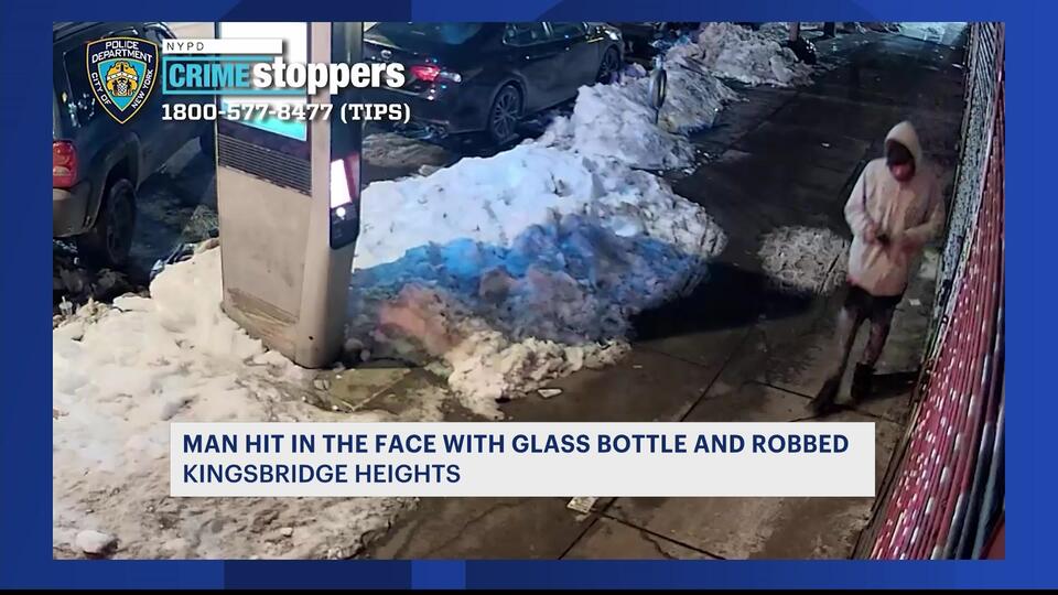Man sought for striking man with glass bottle during robbery at ...