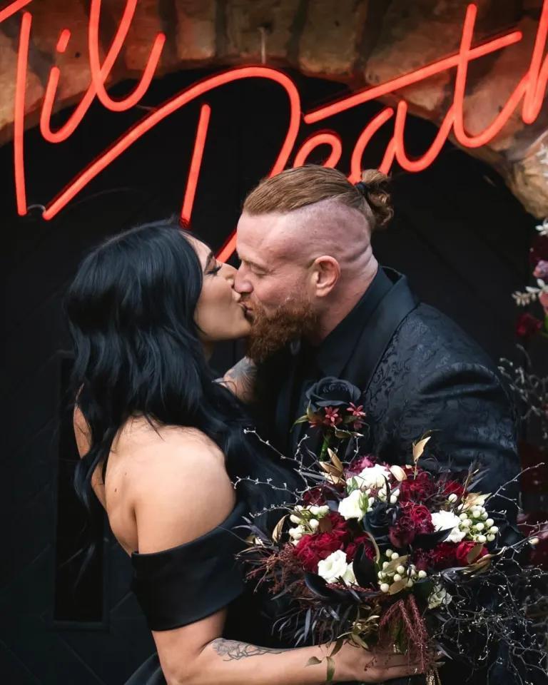 WWE star Rhea Ripley marries pro wrestler Buddy Matthews in gothic ceremony as pair break from ...