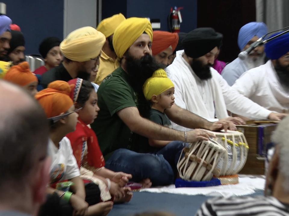 Over a dozen local religious groups come together in prayer, song and ...