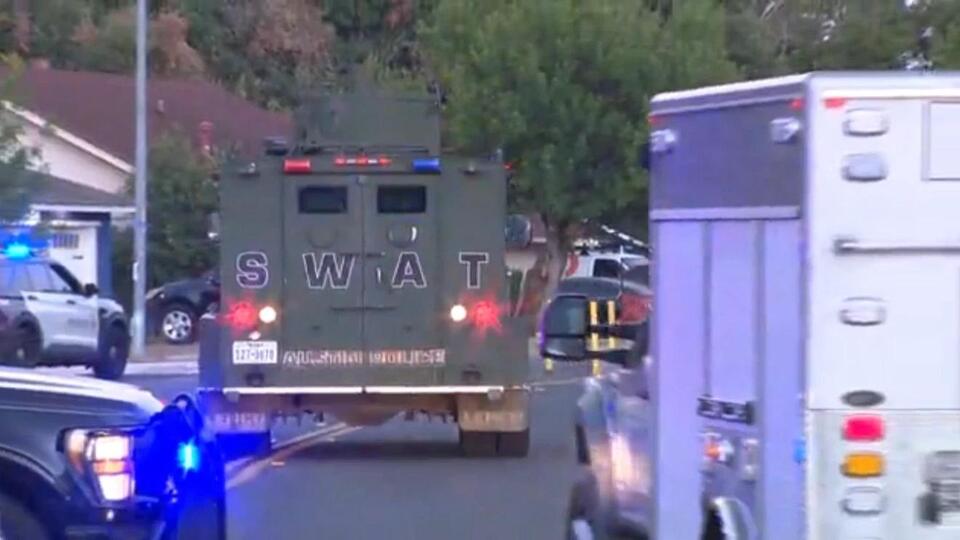 Suspect in custody after SWAT teams respond to barricaded subject in NE ...