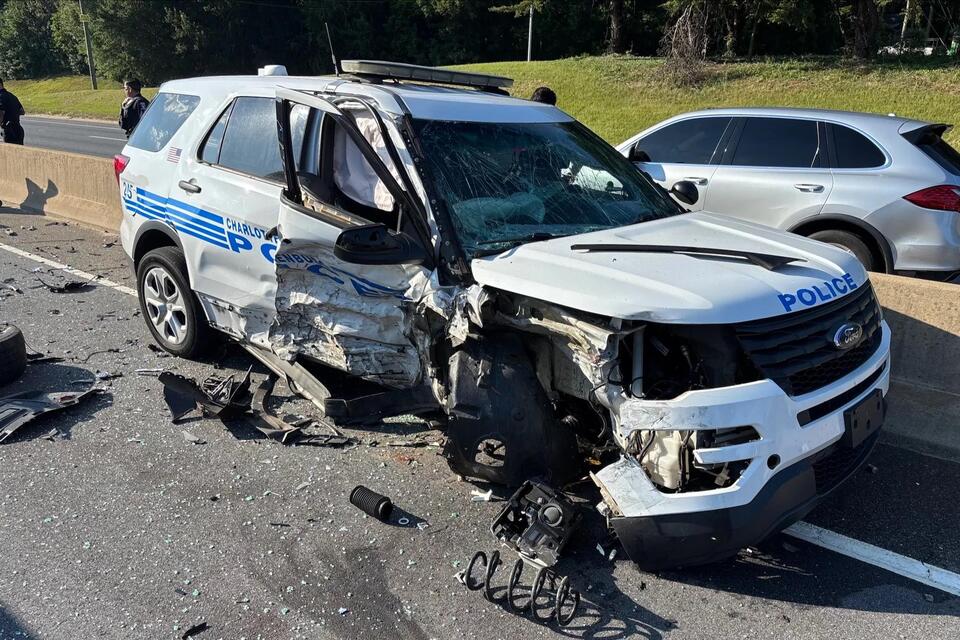 Driver with suspended license charged after hitting CMPD patrol car ...