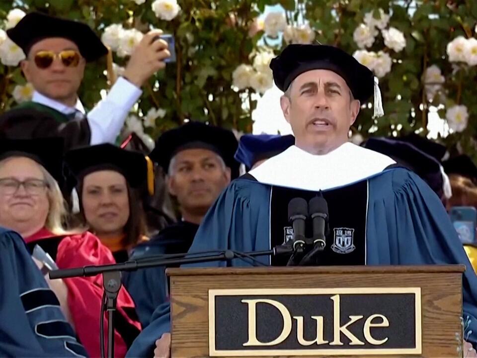 Group of students walk out of Duke graduation before Jerry Seinfeld’s speech