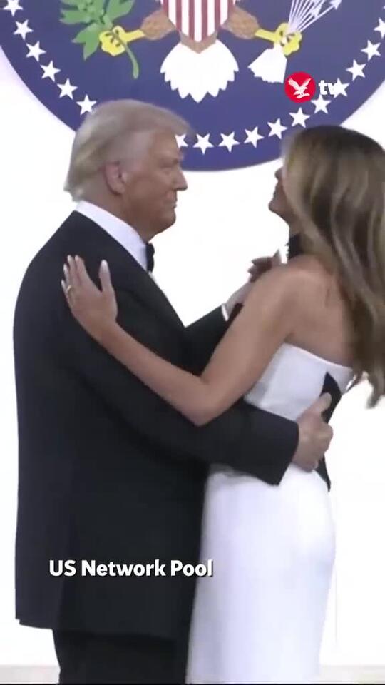 Donald Trump and wife Melania took to the stage at the Commander-In-Chief Inaugural Ball for ...