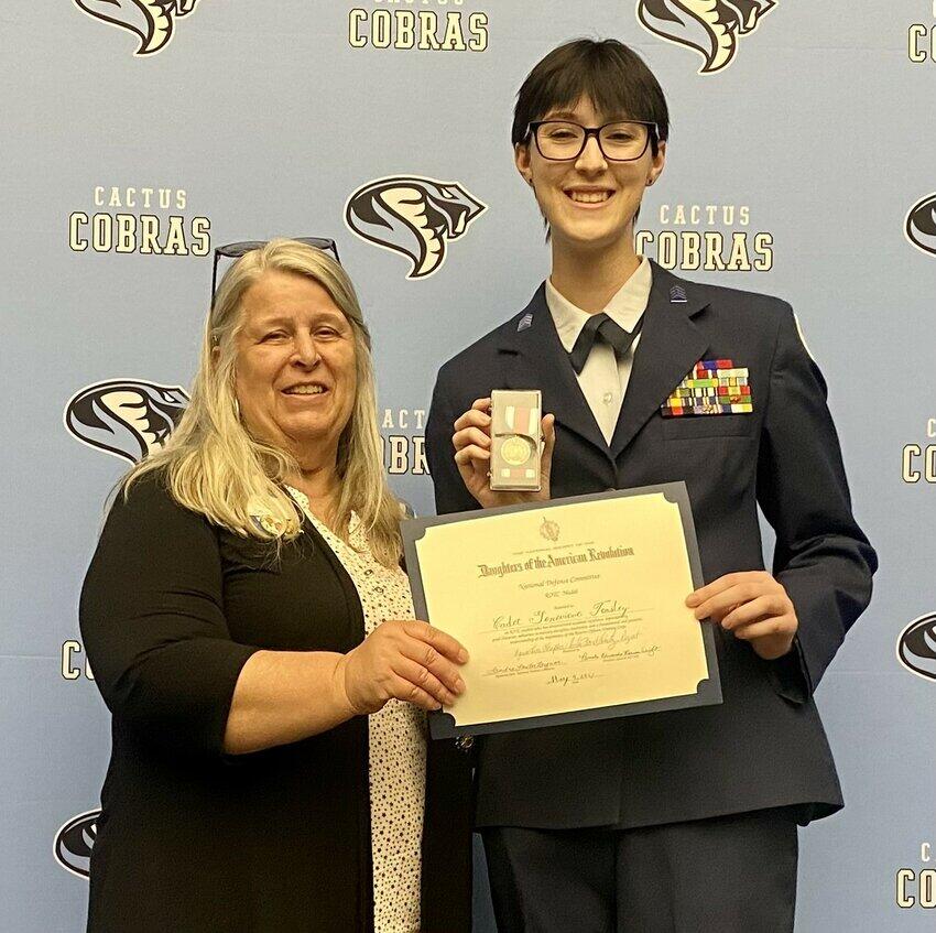 Daughters present JROTC certificate, medal - NewsBreak