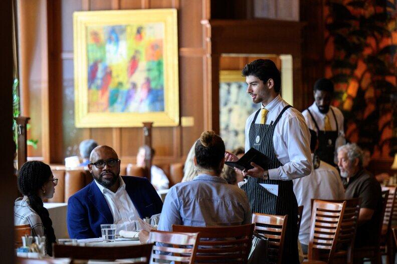 Who should pick up the check when going out to eat? - NewsBreak