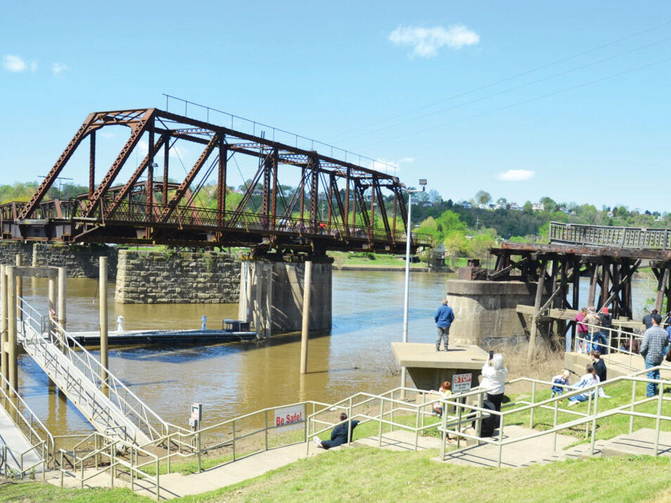 Volunteers turn Historic Harmar Bridge so sternwheeler can pass through