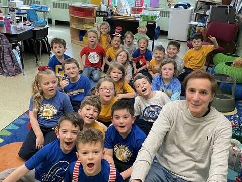 Judge Stevens reads to Good Shepherd studentsduring Read Across America ...