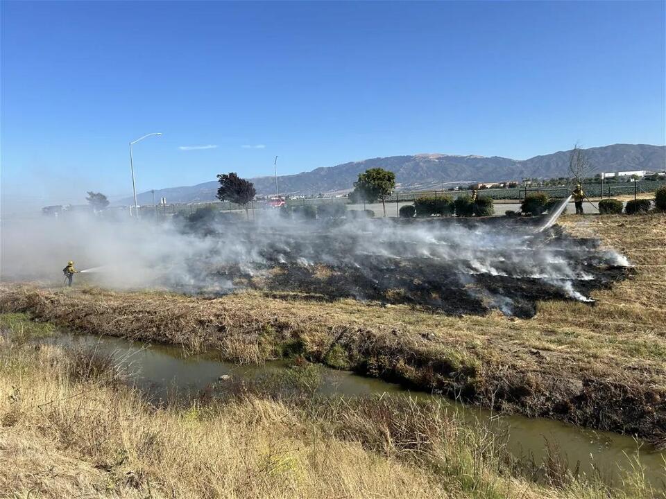WATCH: Video shows man walking away from fire sparked along Roy Diaz ...