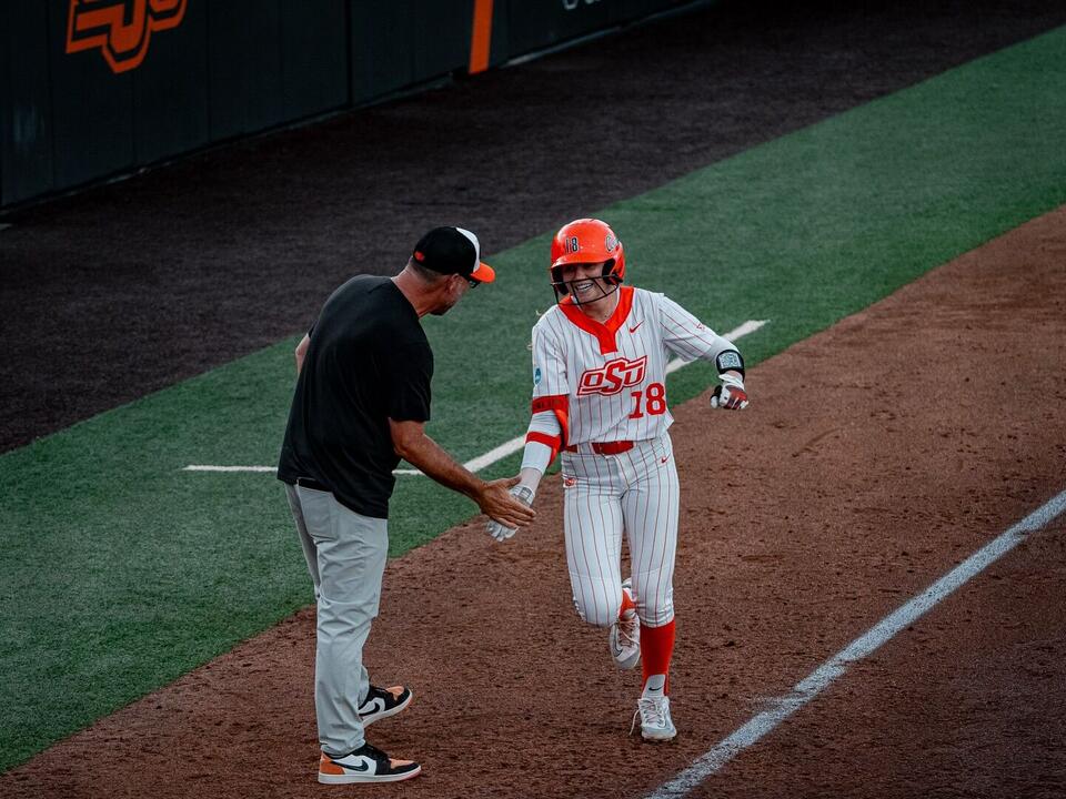 Cowgirls run-rule Arizona Wildcats 8-0, play again Saturday night