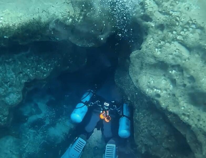 Horror as diver dies in notorious underwater cave after getting trapped ...